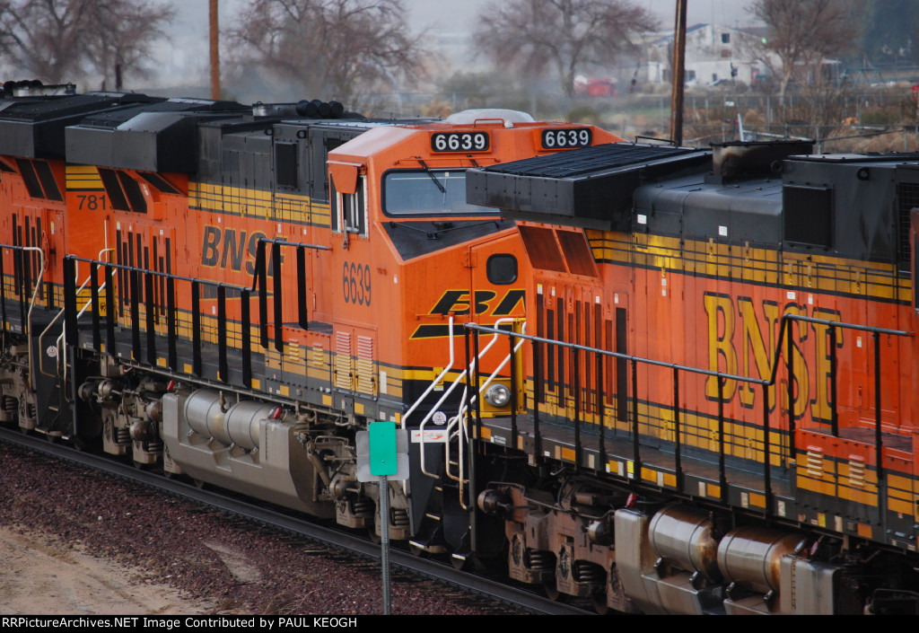 BNSF 6639 heads eastbound pulling a Z as the # 3 unit in a consist of 4 Locomotives. (Too Bad ...
